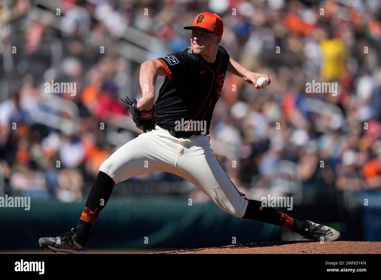 San Francisco Giants starting pitcher Kyle Harrison throws against the ...