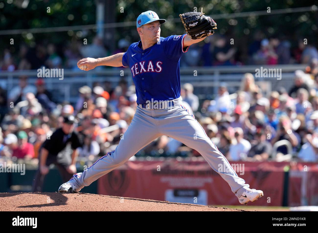 Texas Rangers starting pitcher Adrian Sampson throws against the San ...