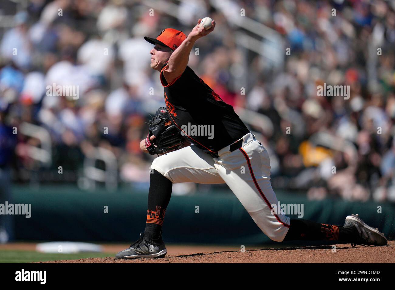 San Francisco Giants starting pitcher Kyle Harrison throws against the ...