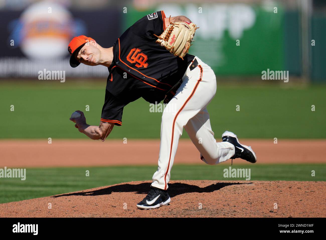 San Francisco Giants relief pitcher Tyler Rogers throws against the Texas Rangers during the ...