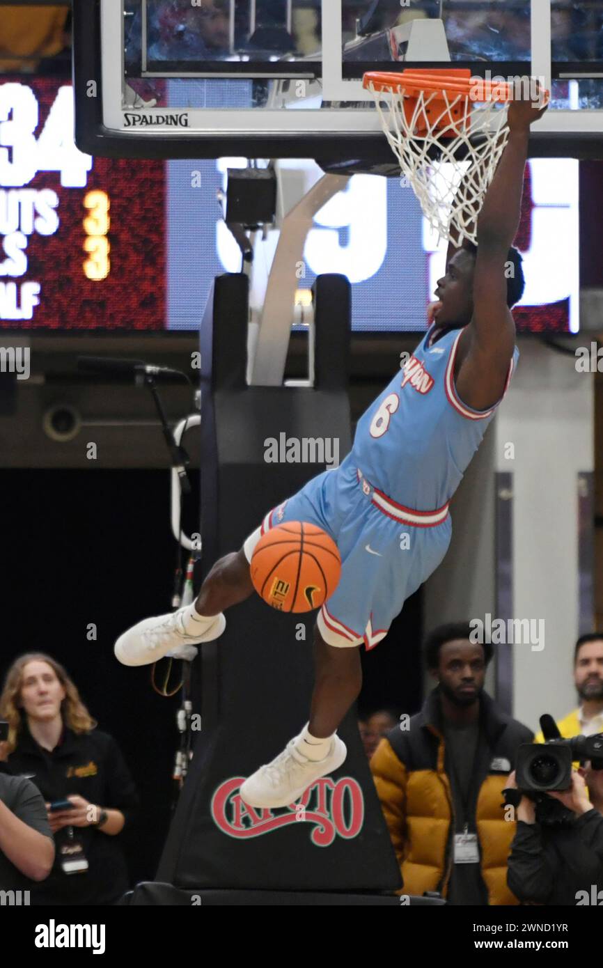 Dayton's Enoch Cheeks dunks against Loyola Chicago during the second ...