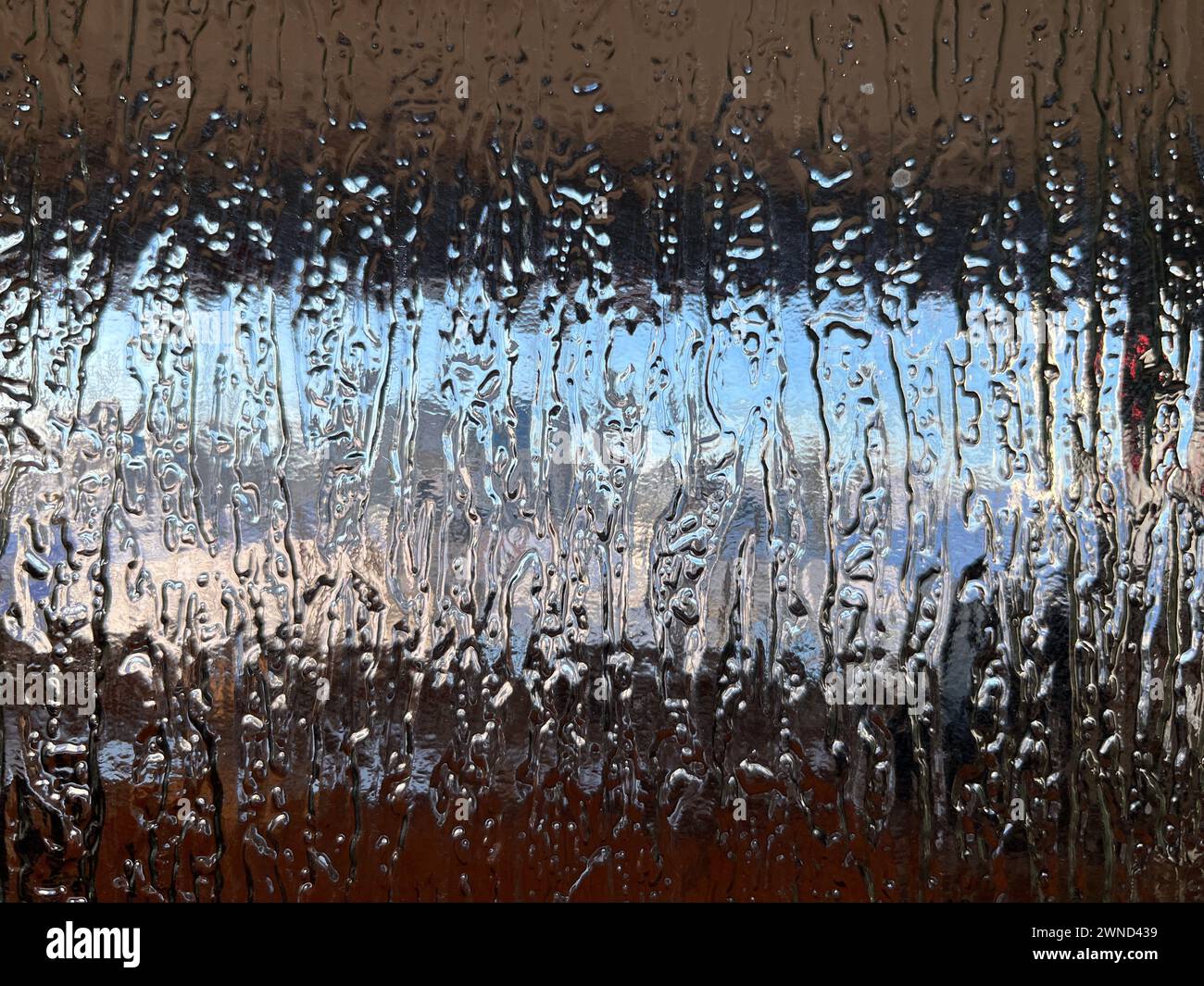 Abstract texture background of water spraying on the windshield of a ...