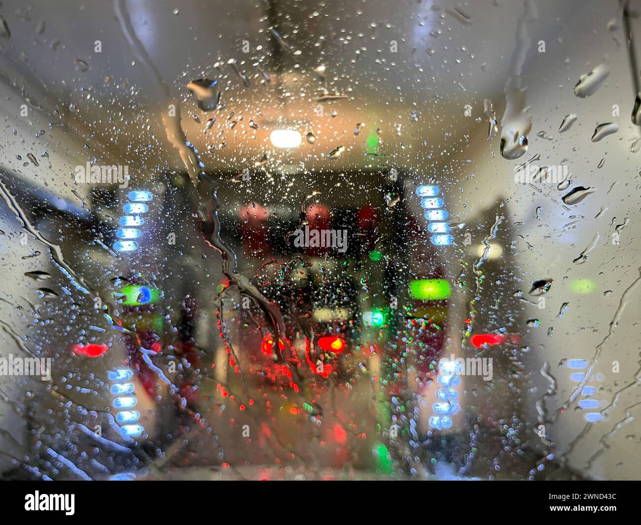 Abstract texture background of water spraying on the windshield of a ...