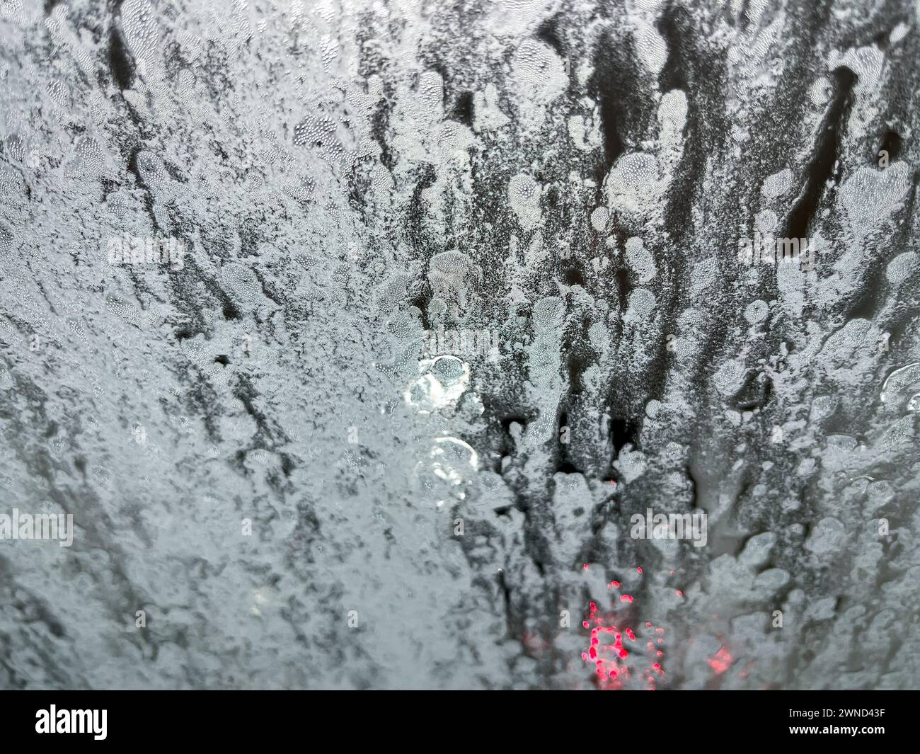 Abstract texture background of water and suds spraying on the ...