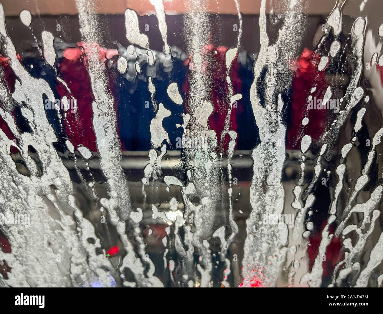 Abstract texture background of water and suds spraying on the ...