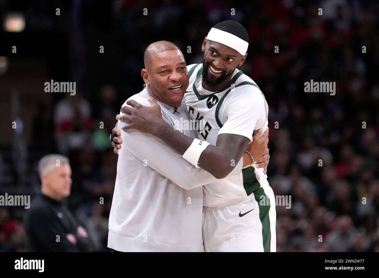 Milwaukee Bucks coach Doc Rivers hugs Bobby Portis during the second ...