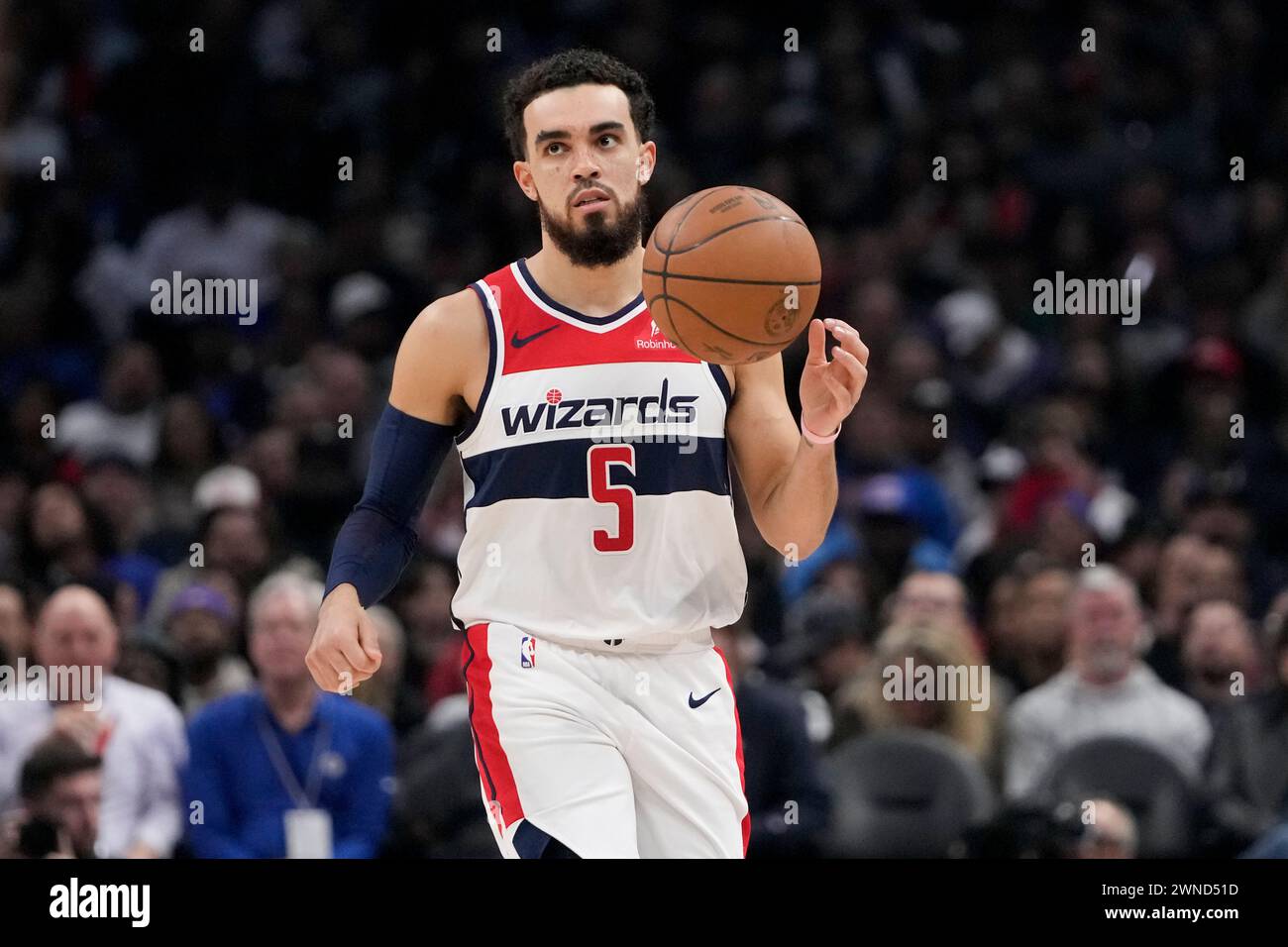 Washington Wizards guard Tyus Jones brings the ball up the court during ...