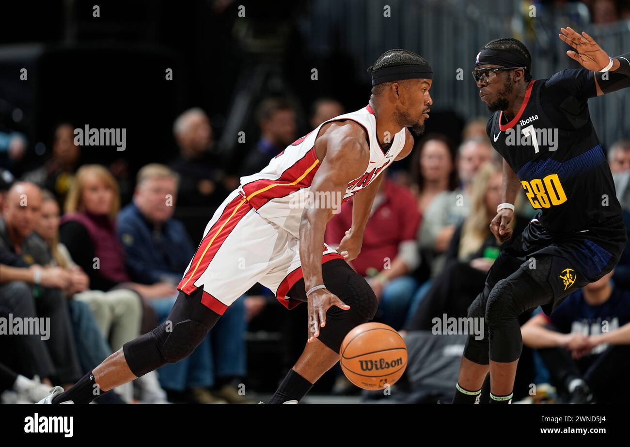 Miami Heat forward Jimmy Butler (22) and Denver Nuggets guard Reggie ...