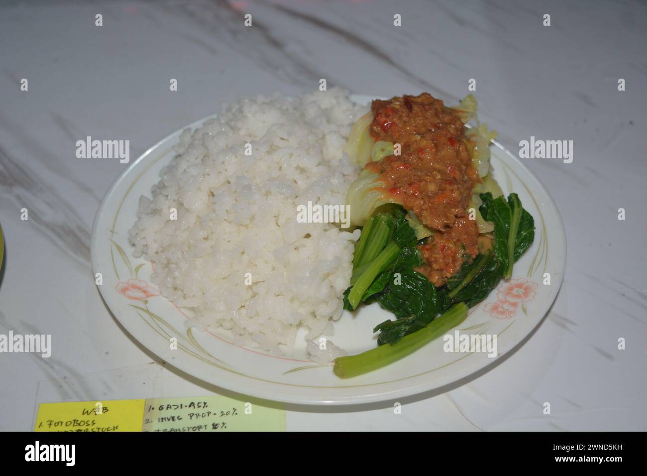 A plate of pecel rice, on a white background Stock Photo - Alamy