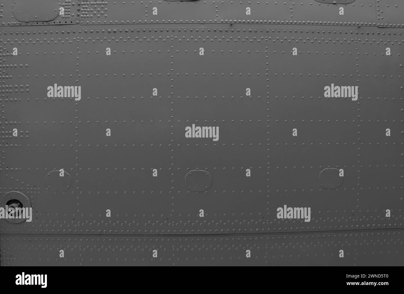 Aluminum surface of the aircraft fuselage. Iron panel of airplane ...