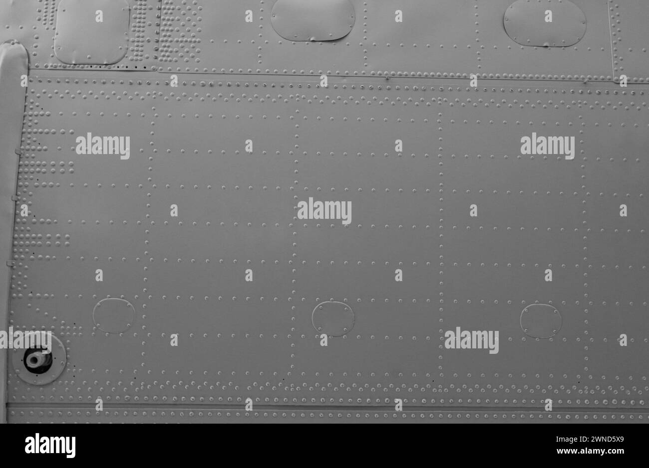 Aircraft skin close up. Rivets on gray metal. Iron panel of airplane ...