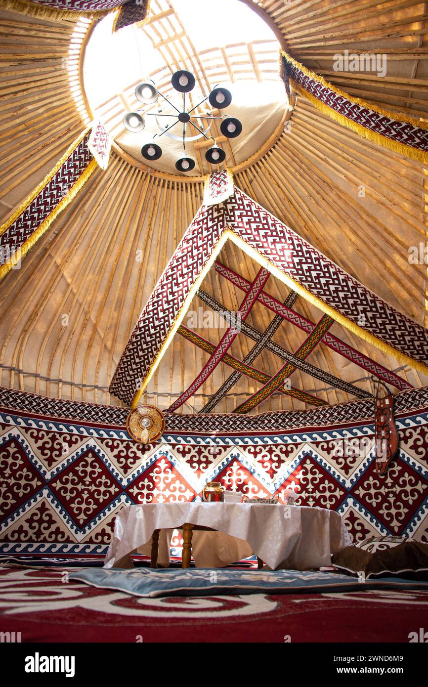 Kazak yurt interior with traditional felt carpets and furniture Stock ...
