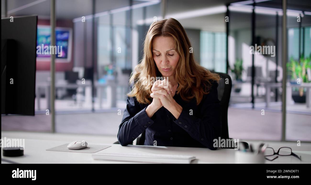 Woman Praying. God Seeking Prayer In Office Stock Photo - Alamy