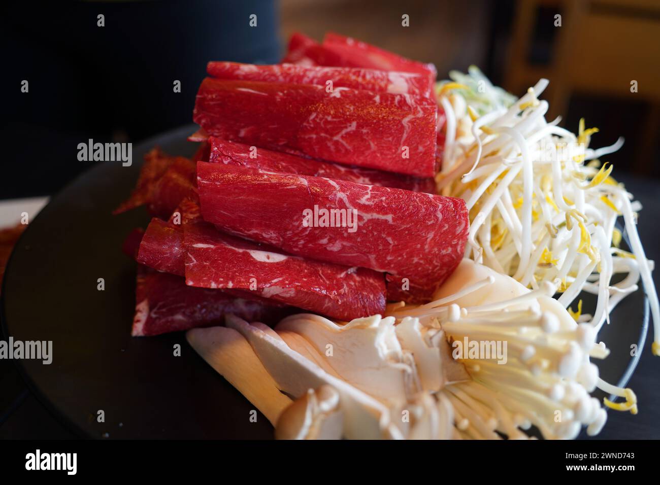 Thinly sliced wagyu beef hi-res stock photography and images - Alamy