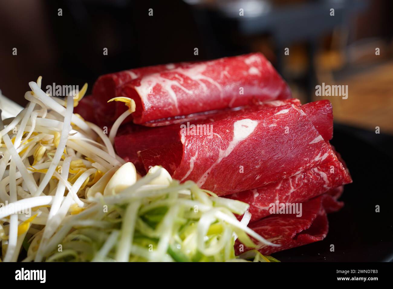 Thinly sliced wagyu beef hi-res stock photography and images - Alamy