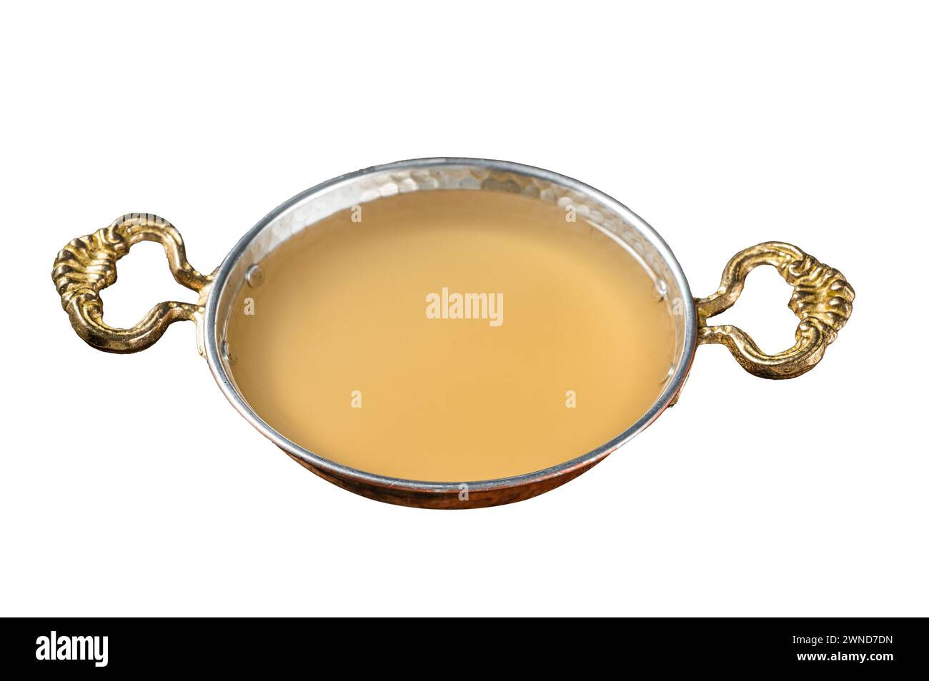 Clear broth stock without meat in cooking skillet. Isolated on white ...