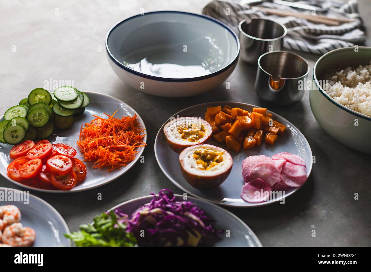 A poke bowl with shrimp prepared by the chef containing white rice ...