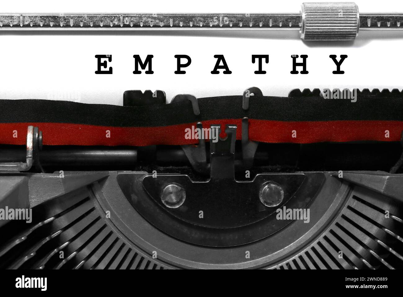 Wide Text Empathy written on white sheet with the old typewriter Stock ...