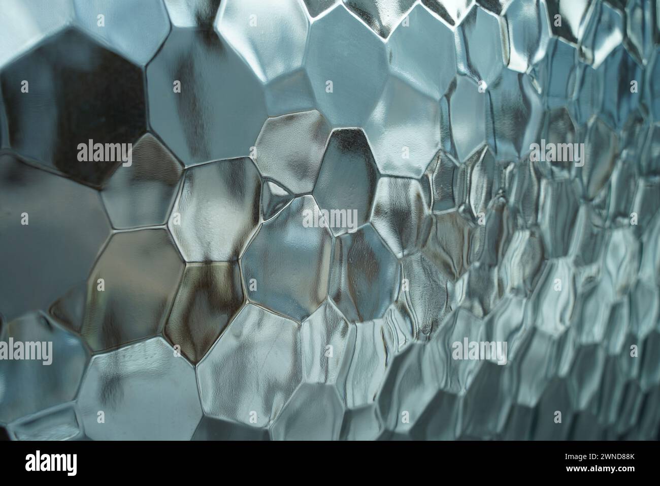 Wallpaper of glass windows with polygonal patterns Stock Photo - Alamy