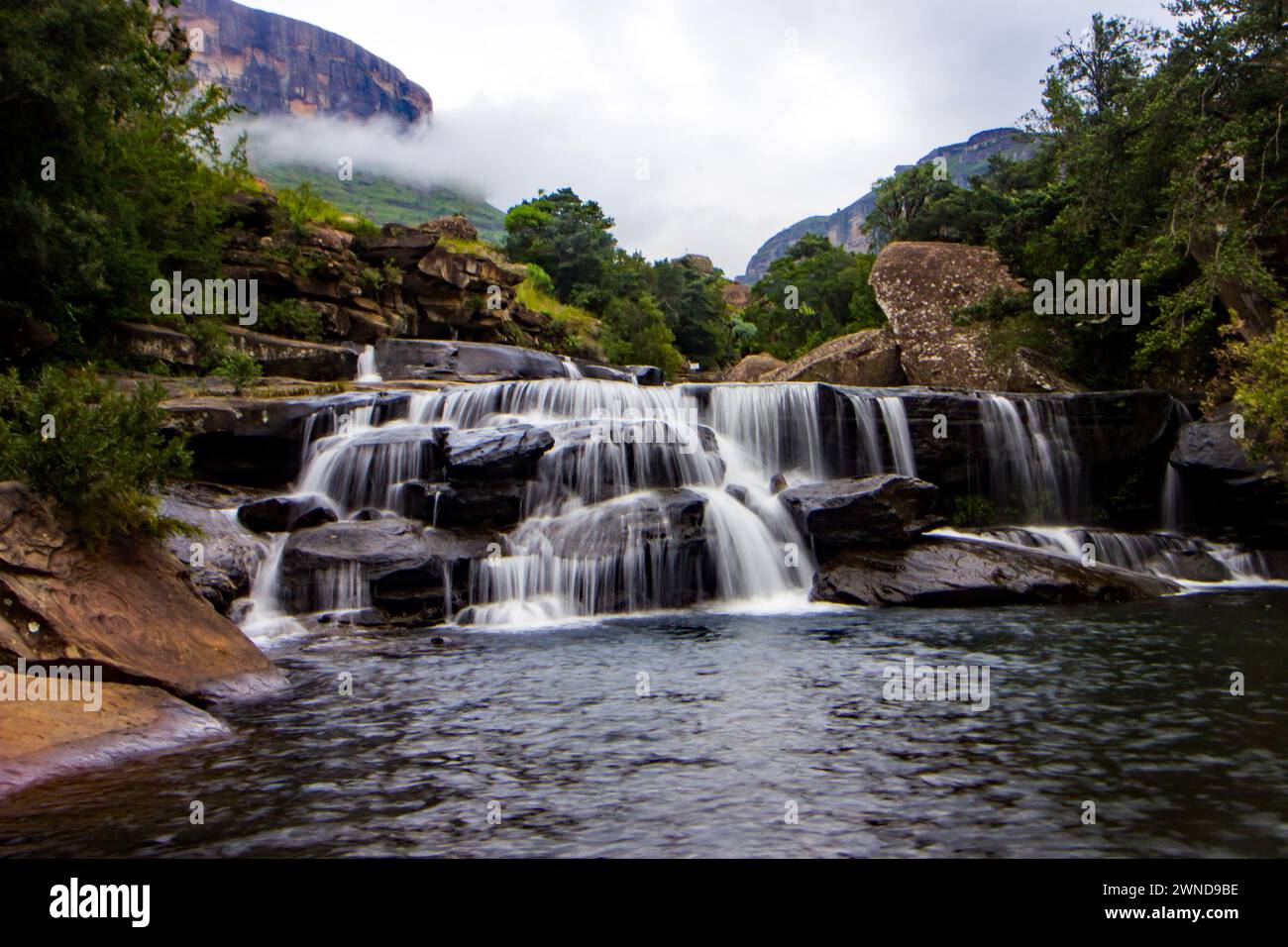 The Mahai cascades in the early morning, with the Drakensberg Mountains ...