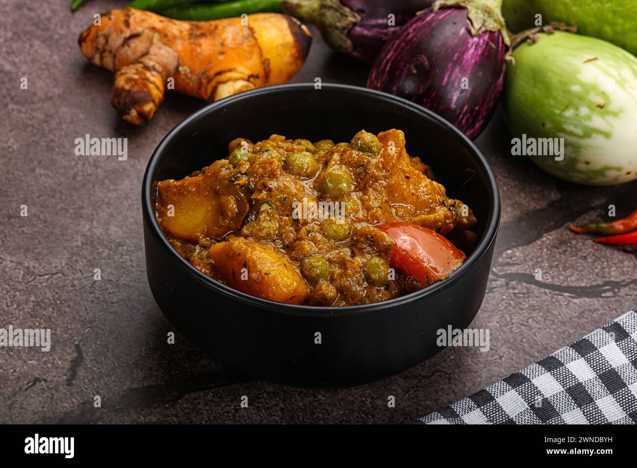 Indian traditional cuisine Aloo mutter - potato with green peas Stock ...