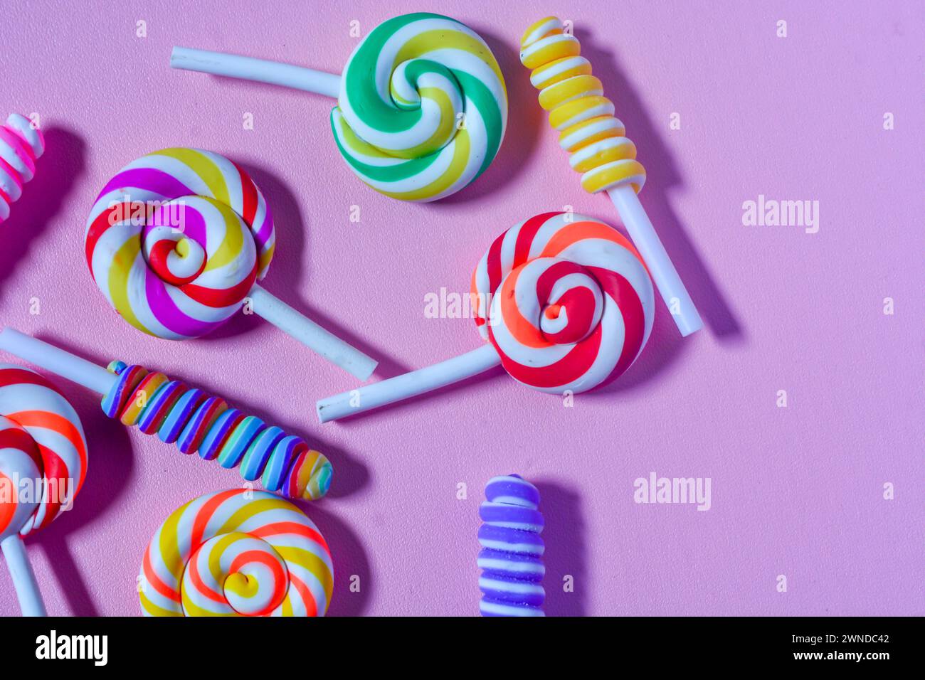 Flat lay sweet candy favorite of small children. Colorful lollipops ...