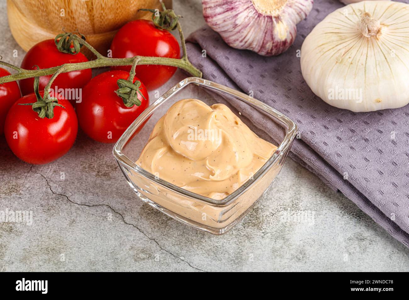 Bowl of Yellow cream grill sauce for burger Stock Photo - Alamy