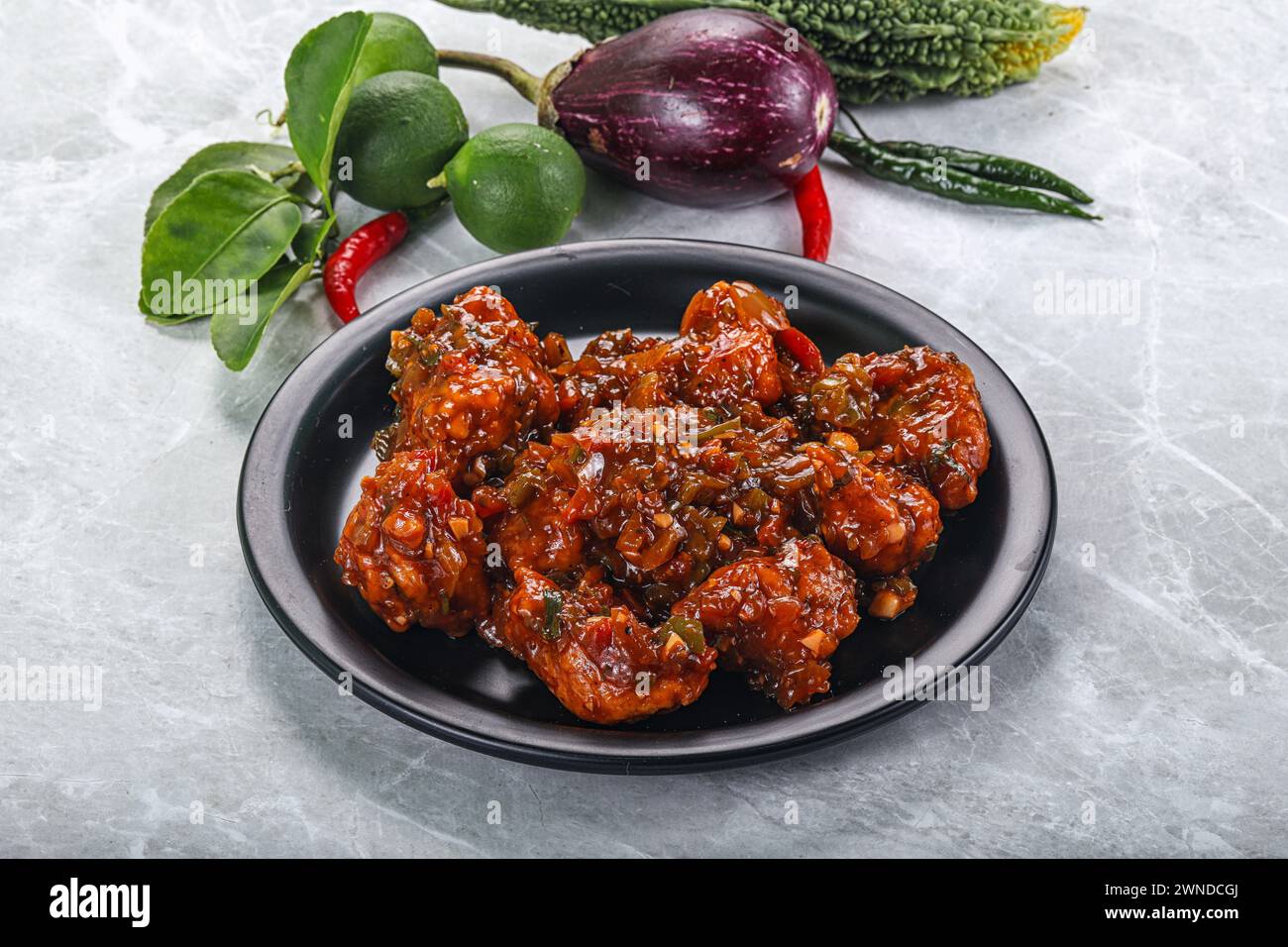 Chinese cuisine - Chicken manchurian gravy with spices Stock Photo - Alamy