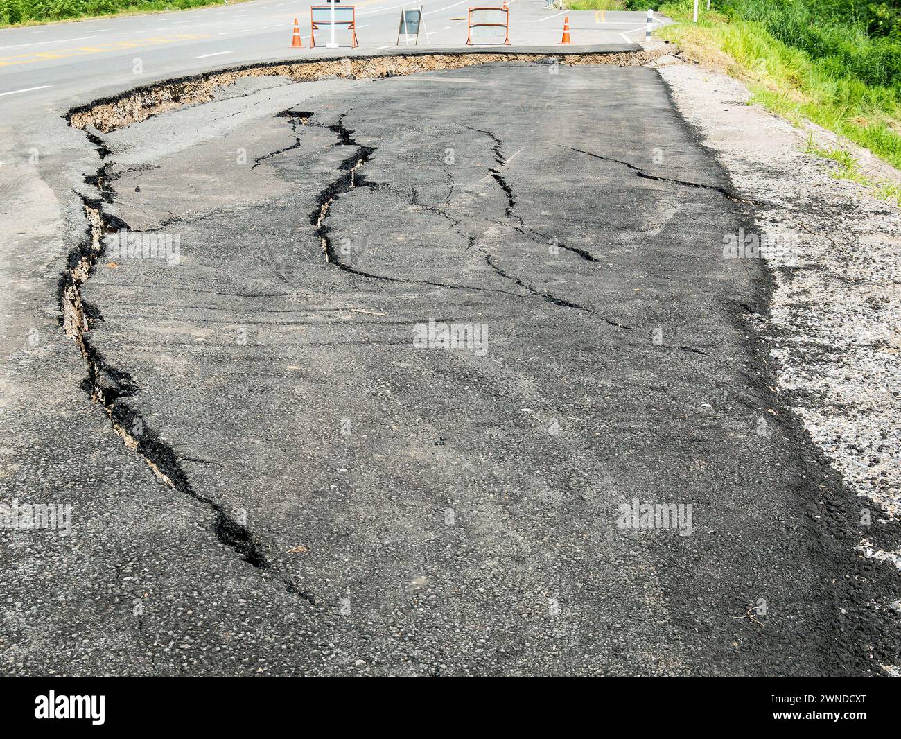 asphalt road cracked and broken texture Stock Photo - Alamy