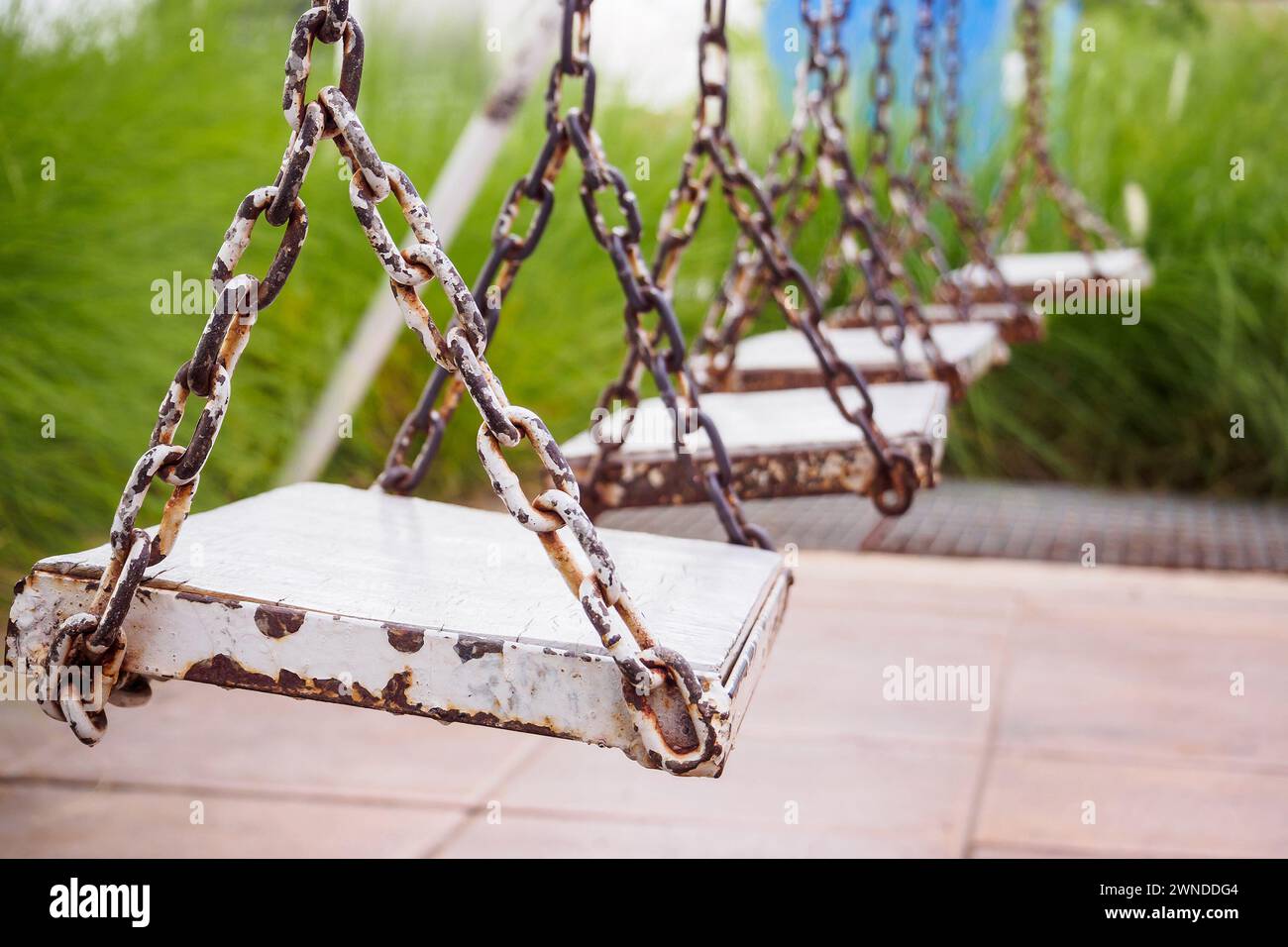 Old metal swing set hi-res stock photography and images - Alamy
