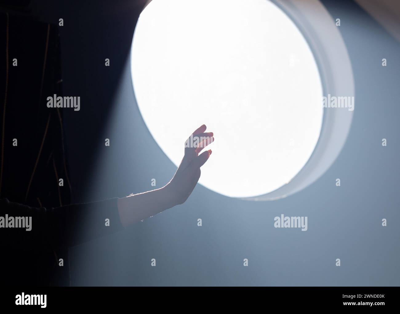 Sunlight window hand hi-res stock photography and images - Alamy
