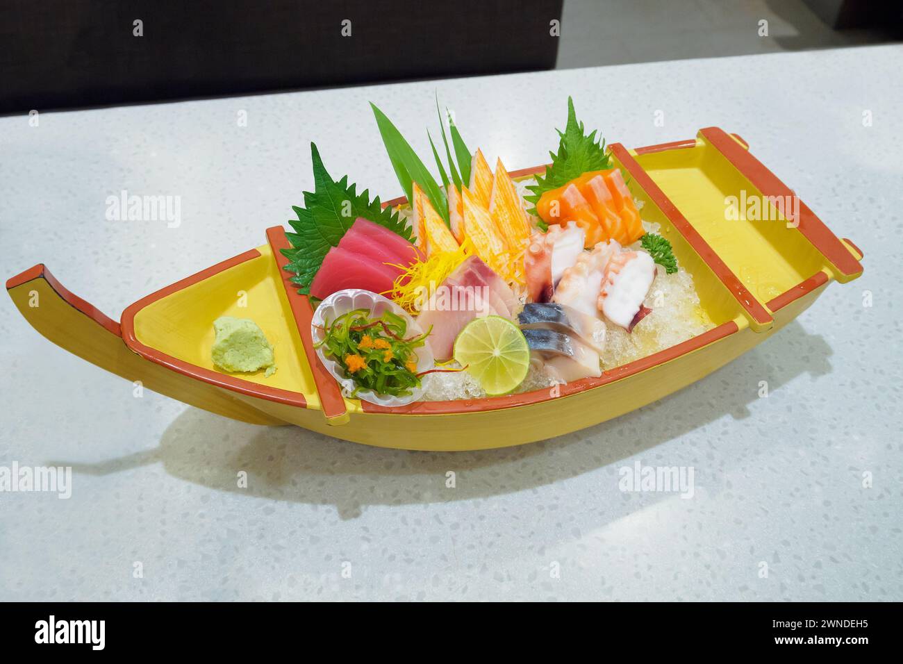 japanese sashimi set on boat plate Stock Photo - Alamy
