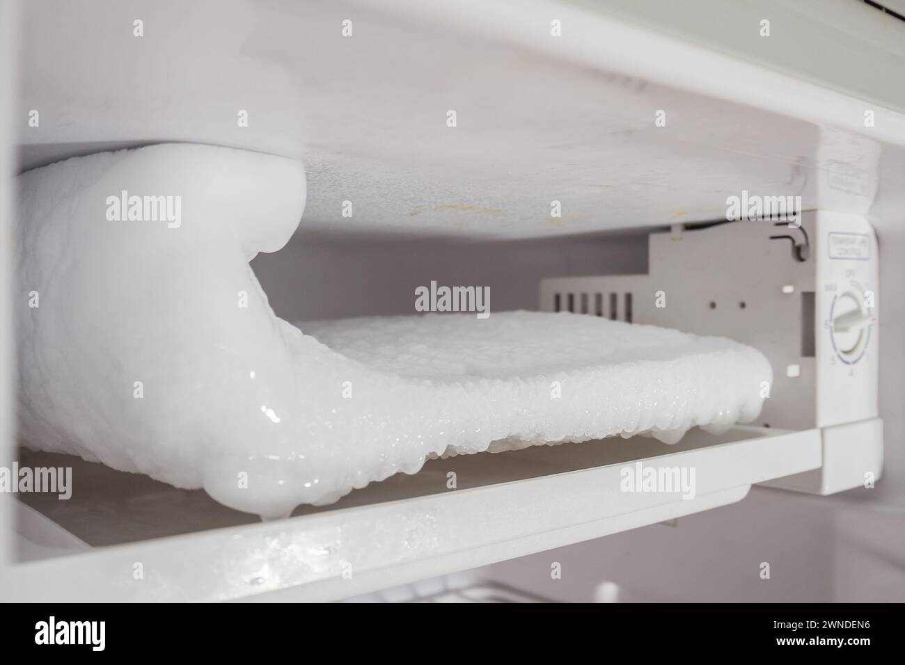 frozen Ice buildup in the freezer of refrigerator Stock Photo - Alamy