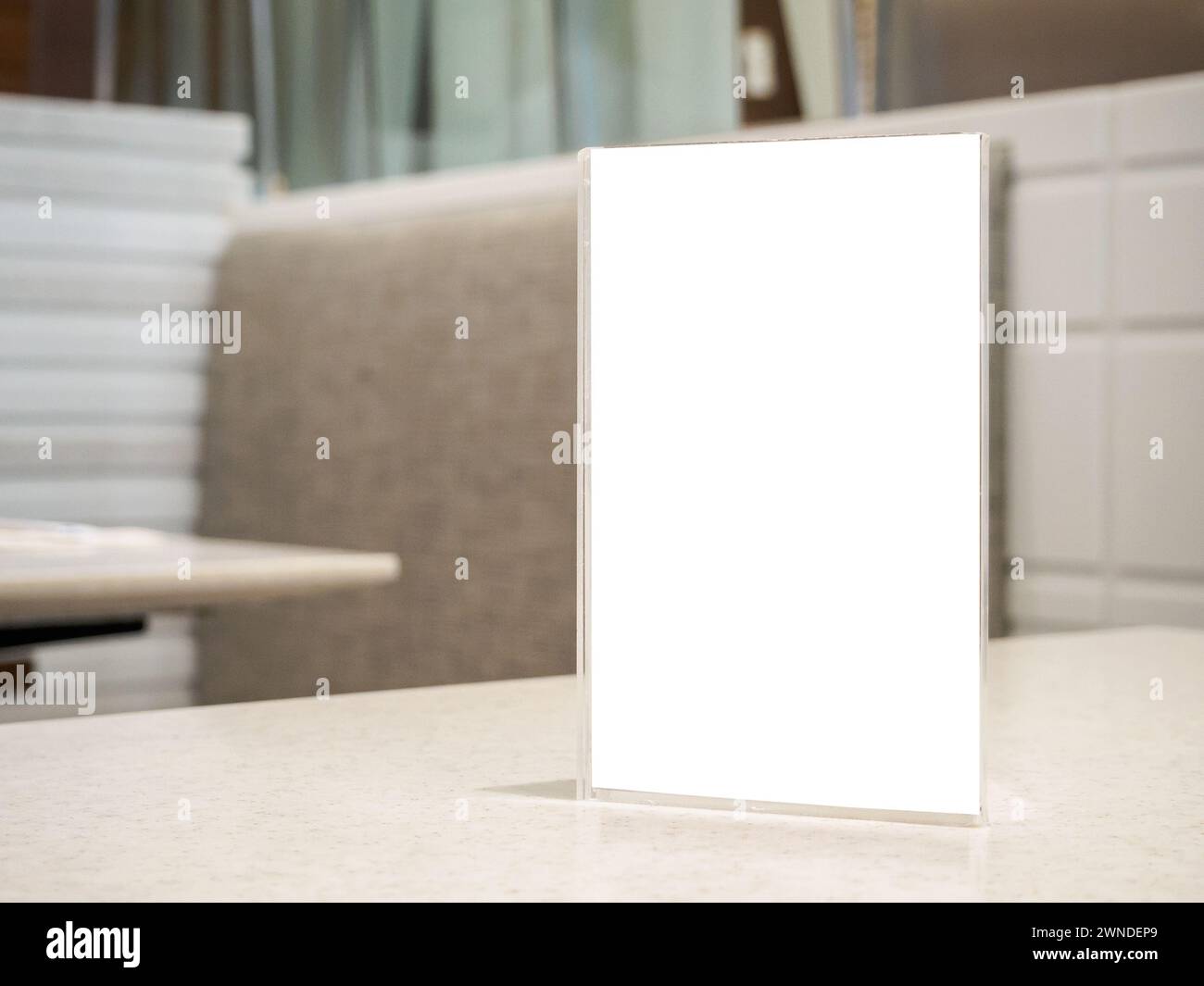 Restaurant table with mock up white sheets paper blank label menu frame ...