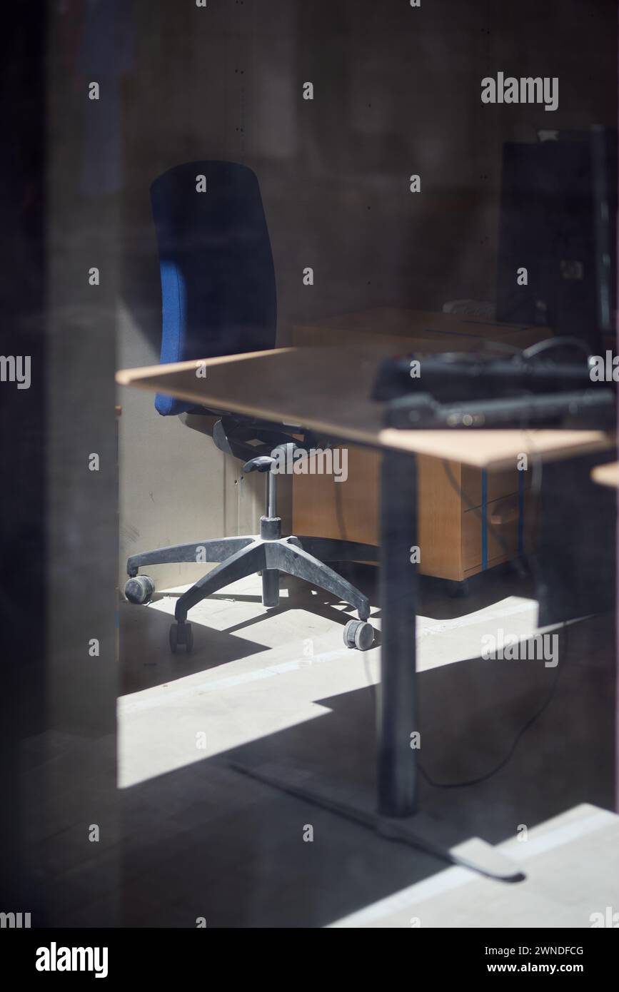 Dusty office seen through window Stock Photo - Alamy