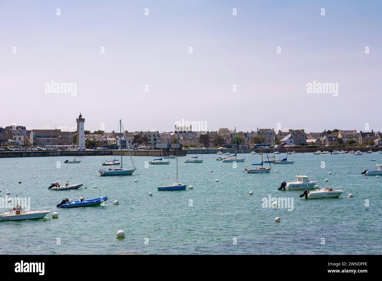 High tide in the Old Port of Roscoff, Finistère, Brittany, France, with ...