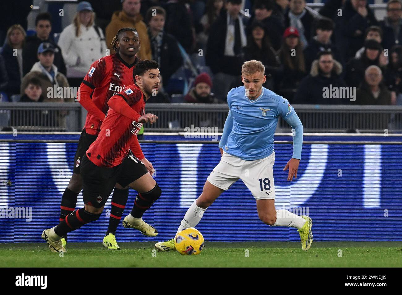 Gustav Isaksen (Lazio)Theo Hernandez (Milan)Rafael Leao (Milan) during ...