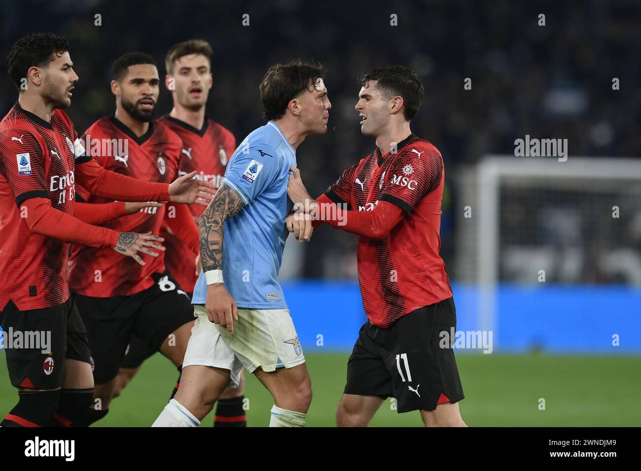 Luca Pellegrini (Lazio)Christian Pulisic (Milan) during the Italian Serie A match between Lazio ...