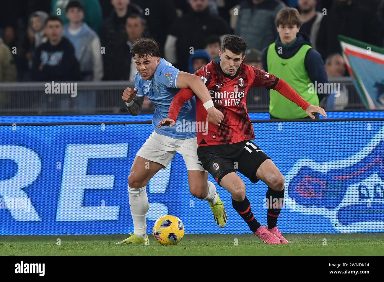 Luca Pellegrini (Lazio)Christian Pulisic (Milan) during the Italian Serie A match between Lazio ...