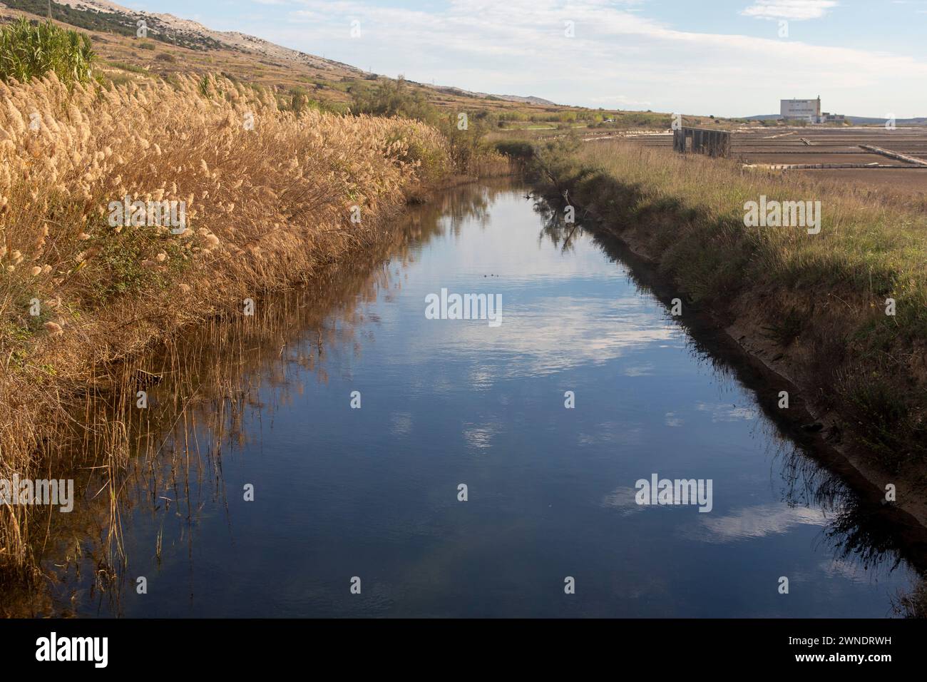 a channel that drains rainwater around the salt pan Stock Photo - Alamy