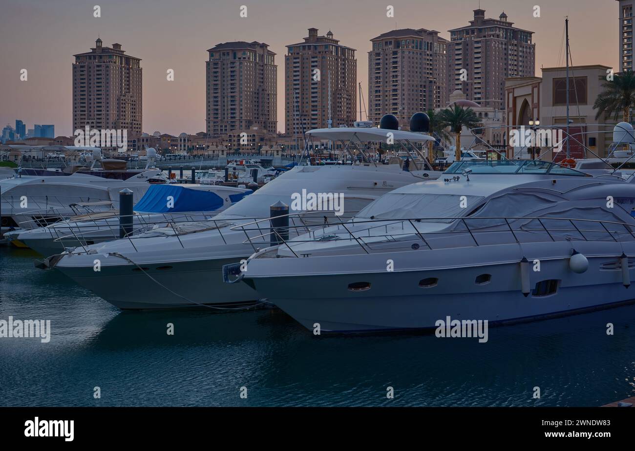 Porto Arabia Marina in The pearl, Doha, Qatar showing luxurious yachts ...