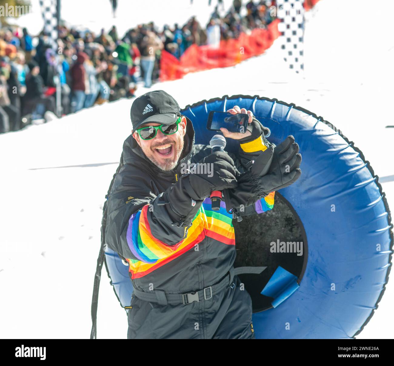 Casey Fosbenner reacts after tubing down the mountain during the 2024 ...