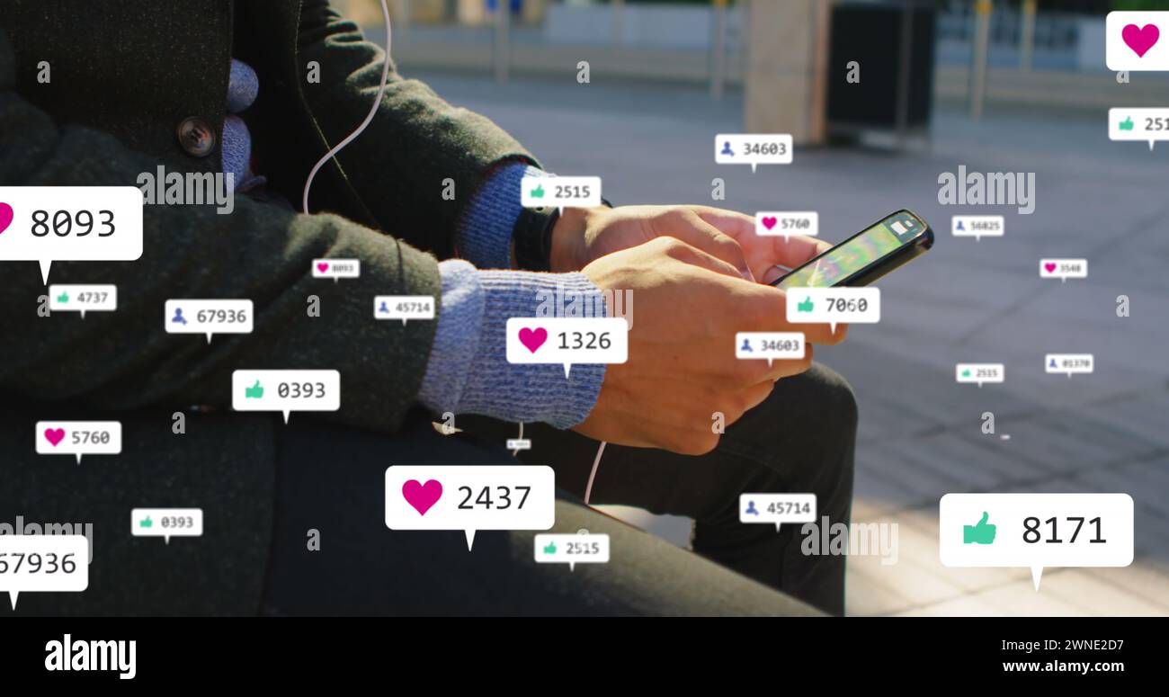 Image of social media icons and numbers on banners over man using ...