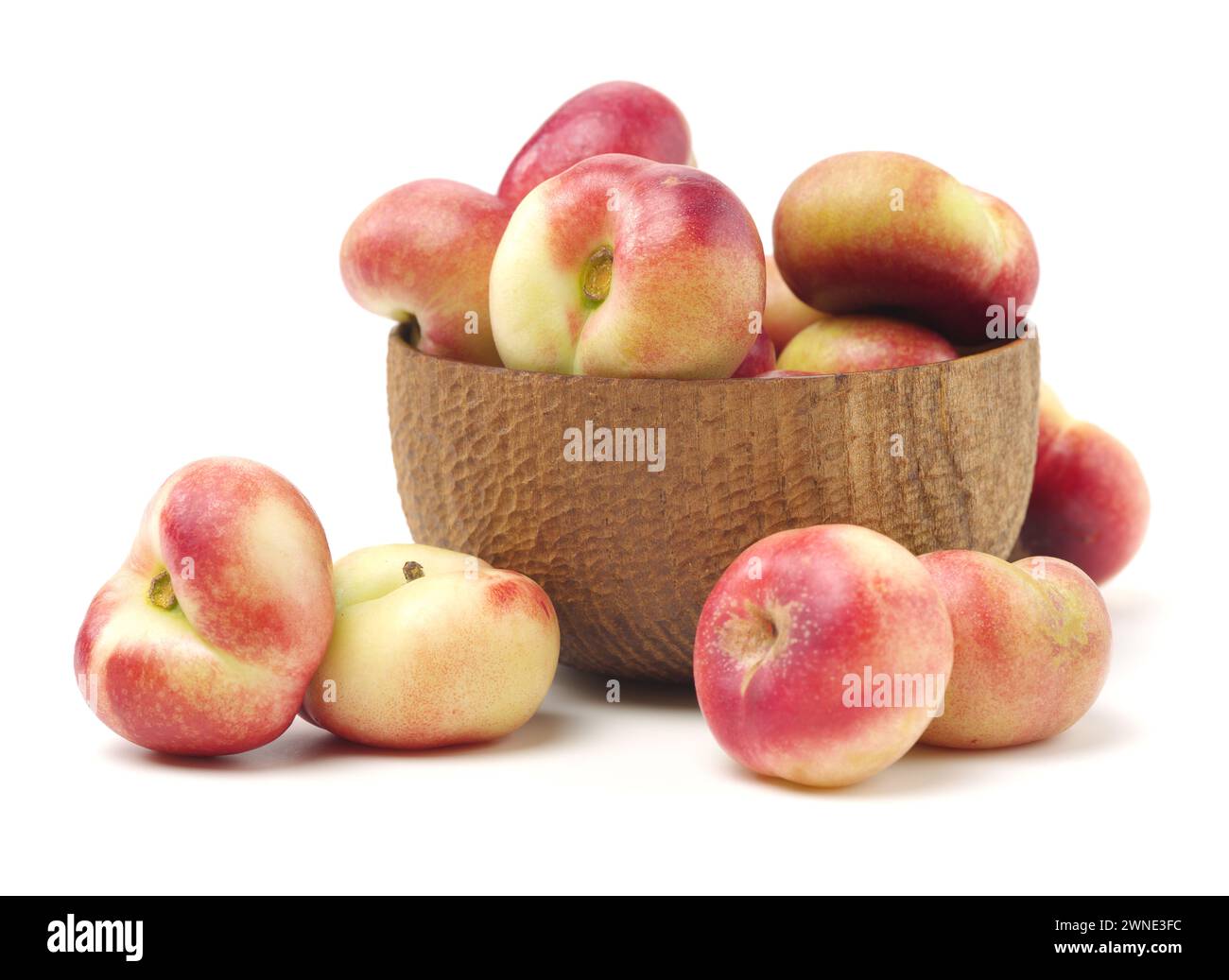 chinese flat peaches on white background Stock Photo - Alamy