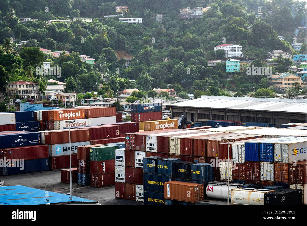 The port of Castries, St Lucia with stacks of shipping containers in ...