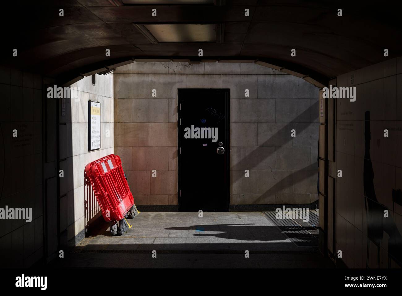 A building barrier and shadows in, Hyde Park Corner, underpass, London ...