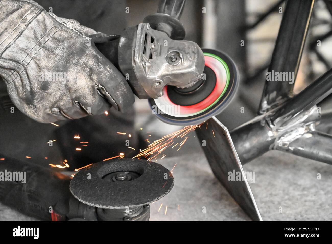 Sparks from the Angle Grinder. Man at work. Industrial worker on ...