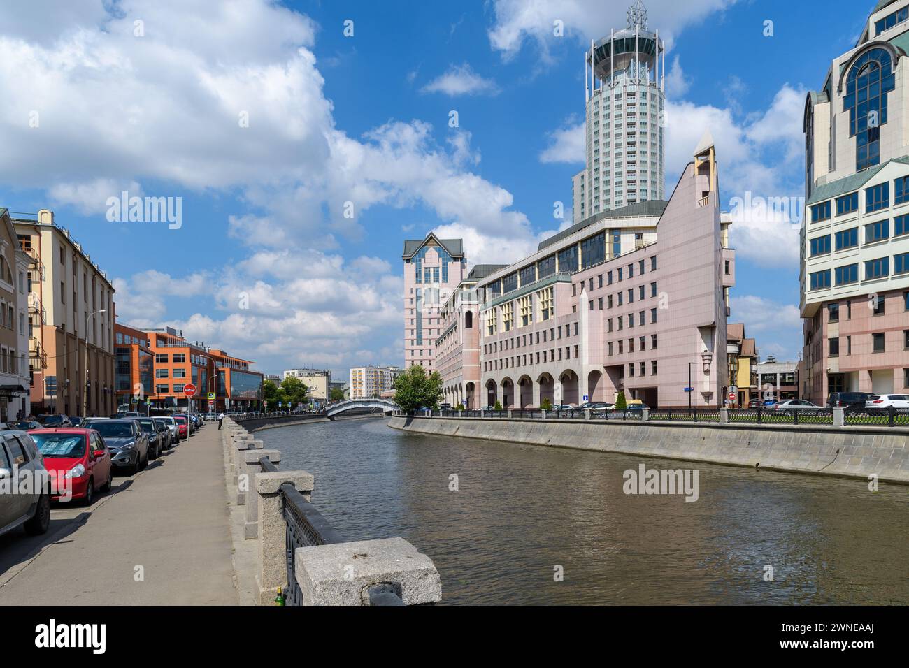 Canal embankment in Moscow with a cast iron fence and a pedestrian ...