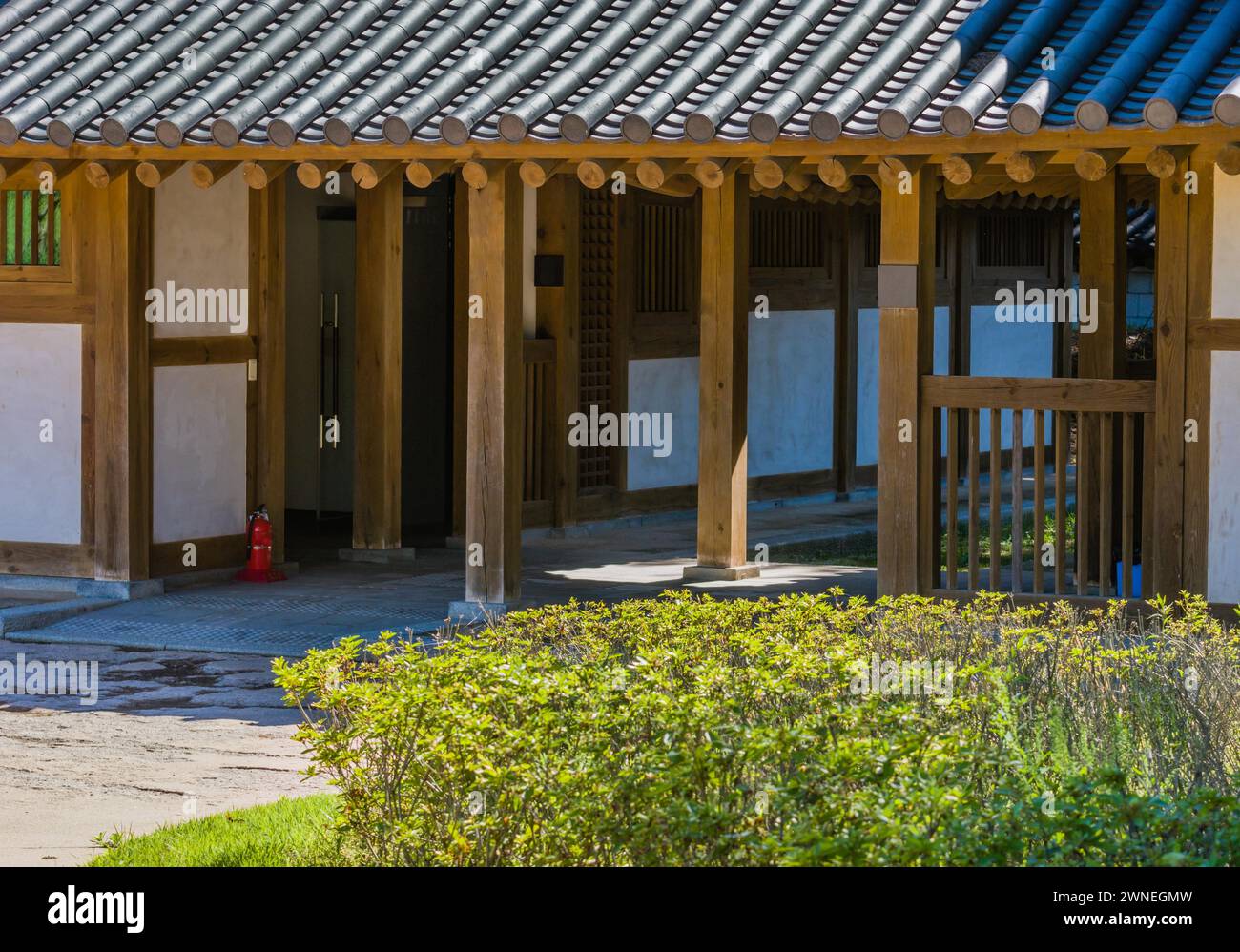 Restroom building with ceramic tile roof and wooden support columns in ...