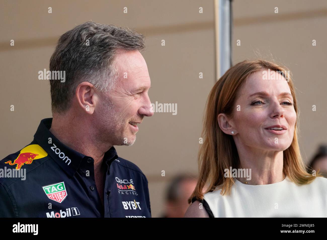 Red Bull team principal Christian Horner, left, walks with his wife Geri Halliwell prior to the ...